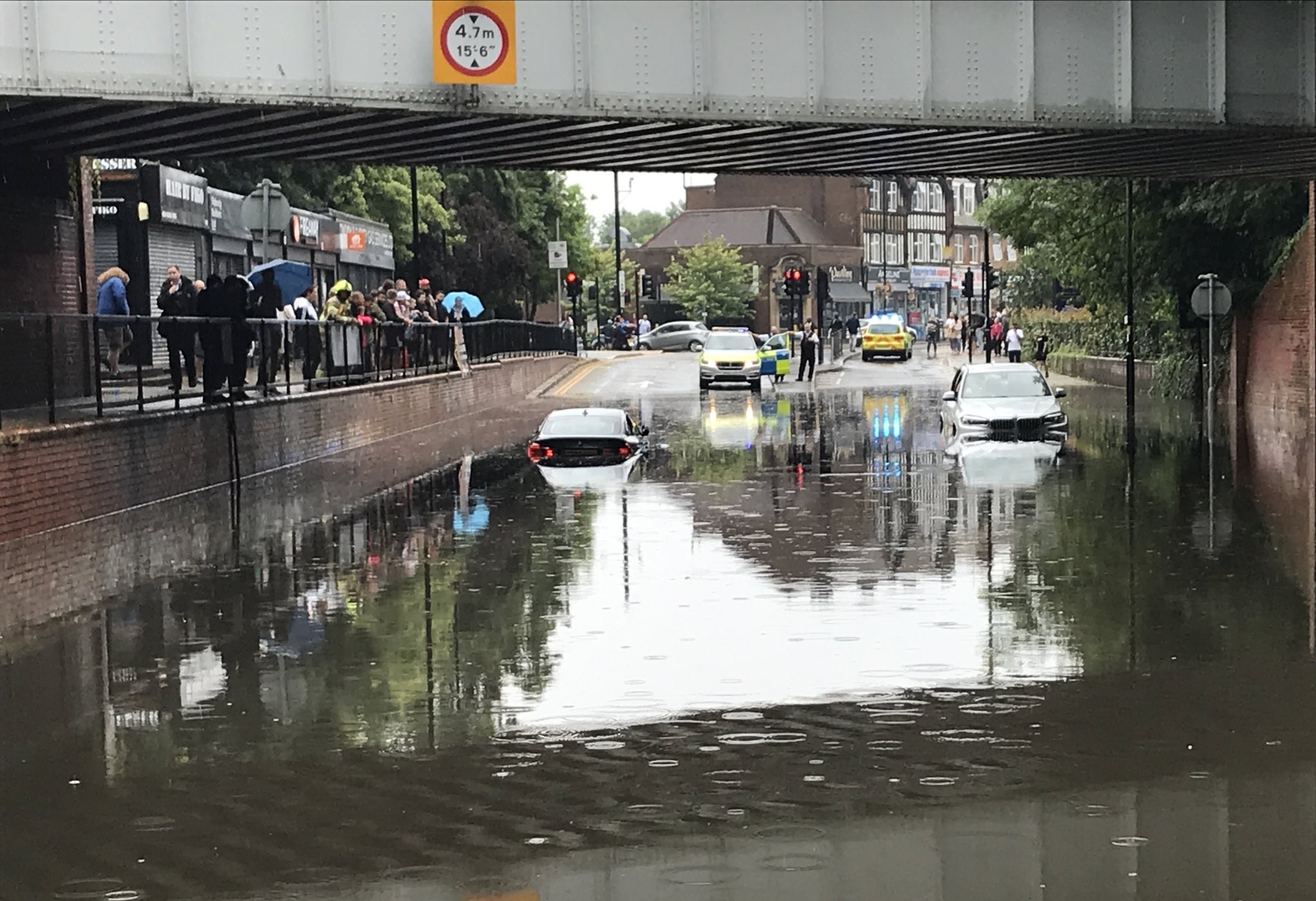 heavy rain causes flooding in london - IHA News